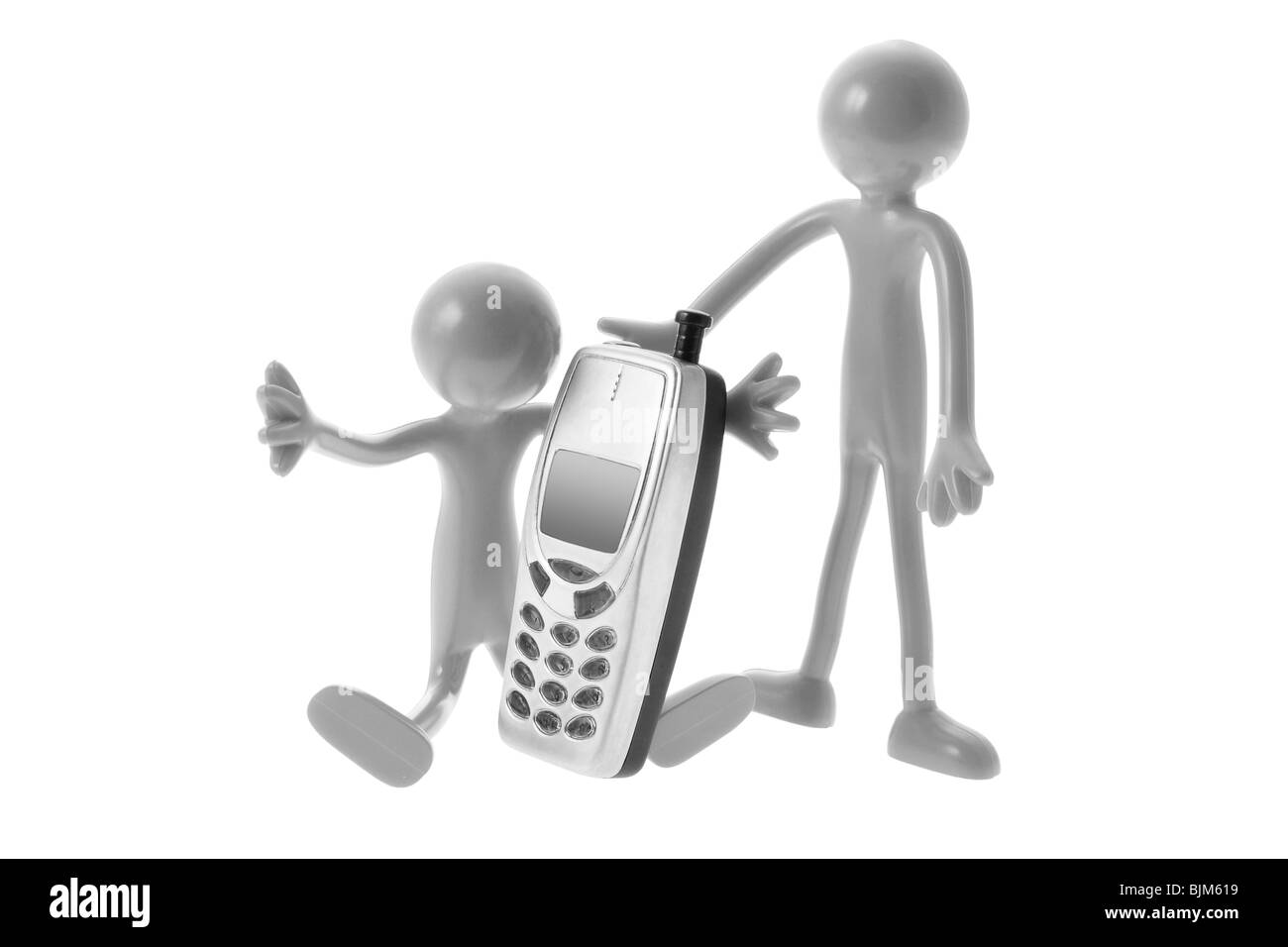 Rubber Figures with Mobile Phone Stock Photo - Alamy