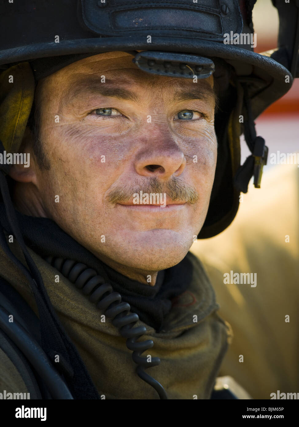 Portrait of a fire fighter Stock Photo - Alamy