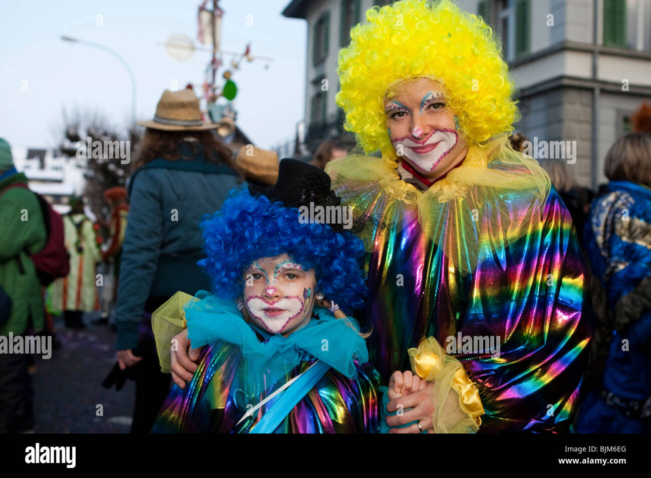 Colourful pair of clowns at the carnival procession in Malters, Lucerne ...
