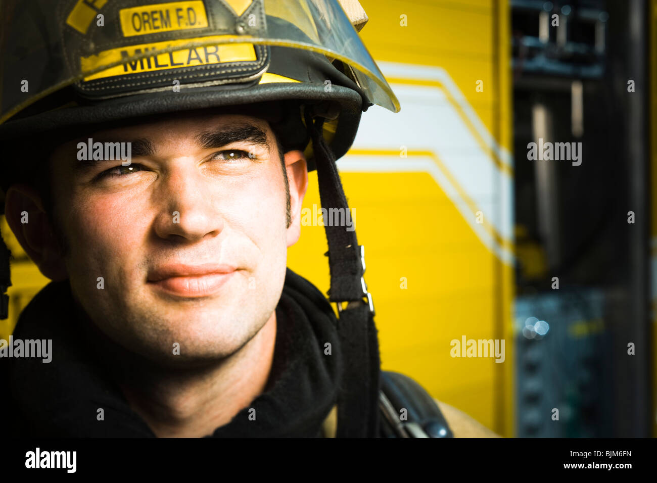 Portrait of a firefighter Stock Photo - Alamy