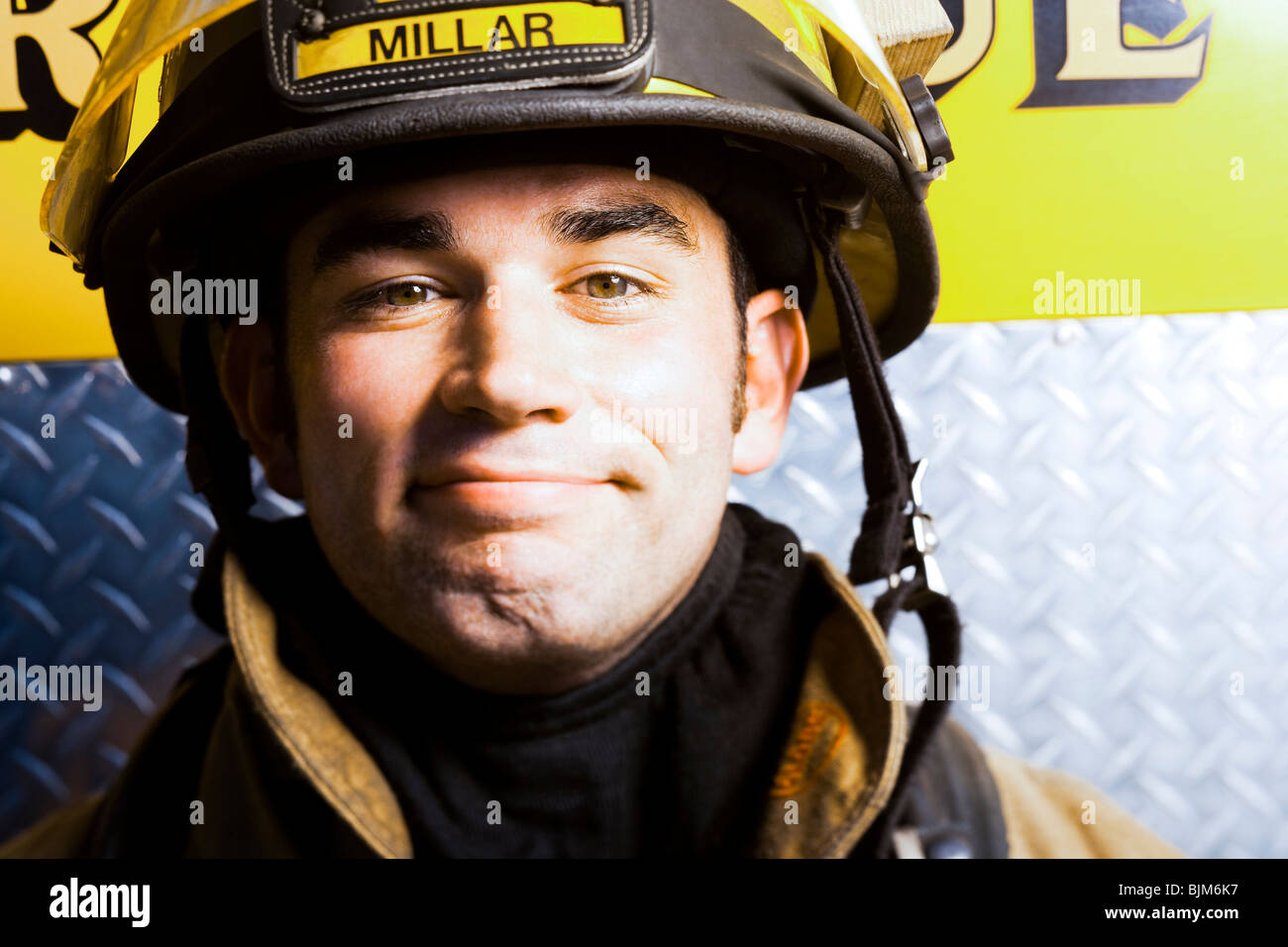 Portrait of a firefighter Stock Photo - Alamy
