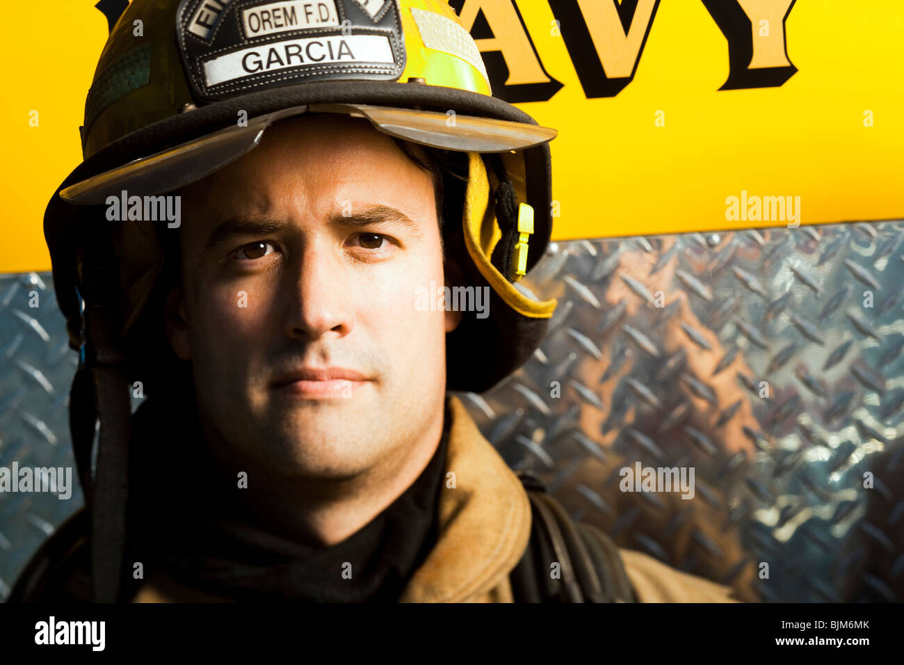 Portrait of a firefighter Stock Photo - Alamy