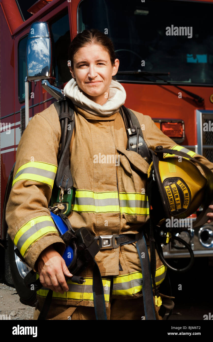 Portrait of a firefighter smiling Stock Photo - Alamy