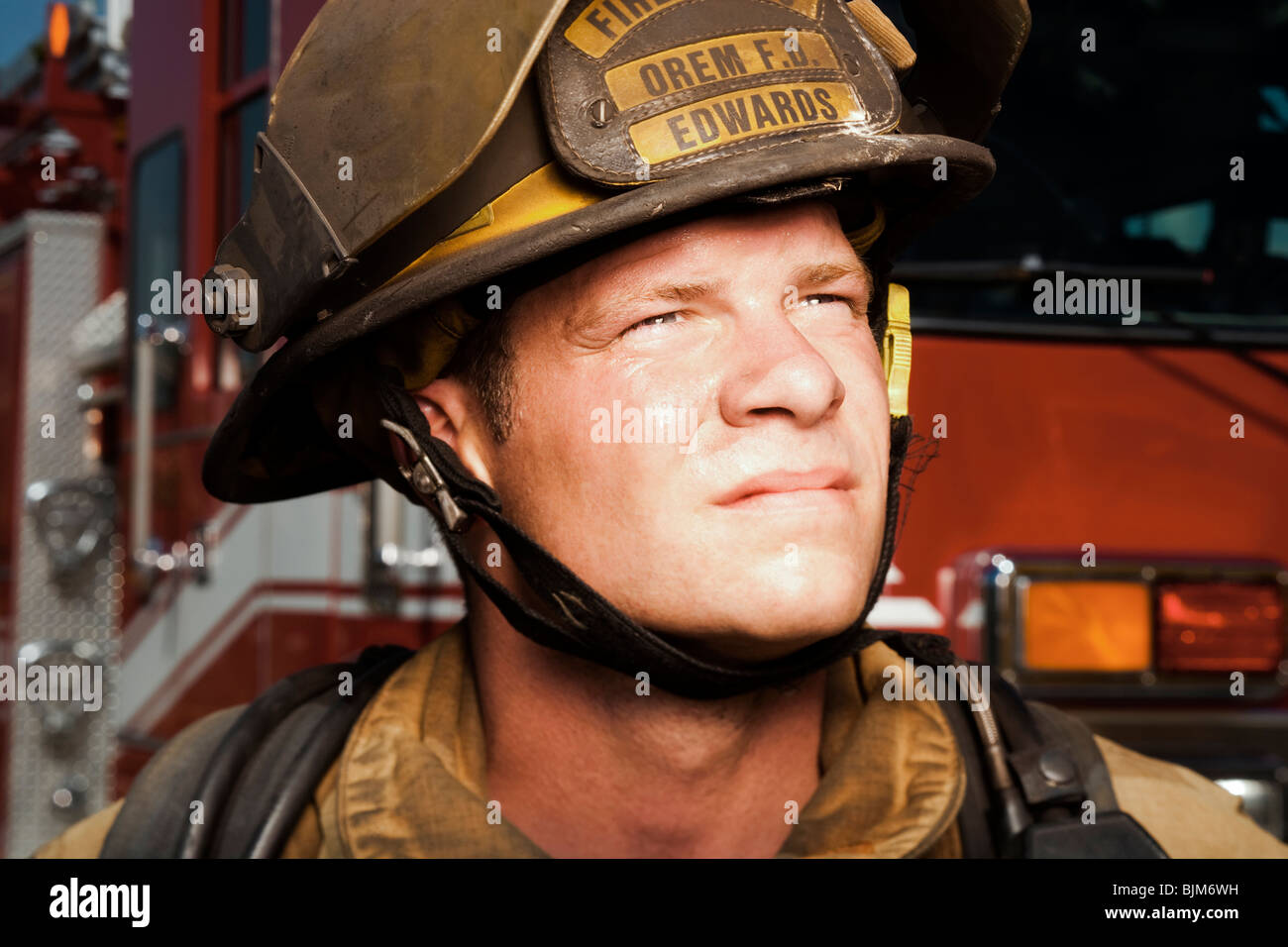 Portrait of a firefighter Stock Photo - Alamy