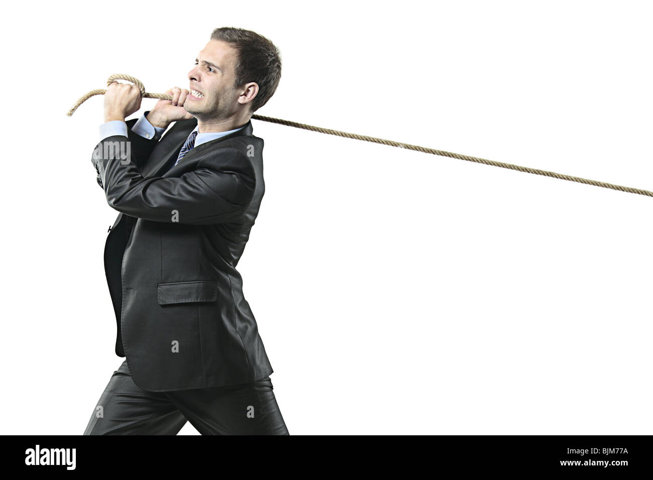 Adult man pulling black Cut Out Stock Images & Pictures - Alamy