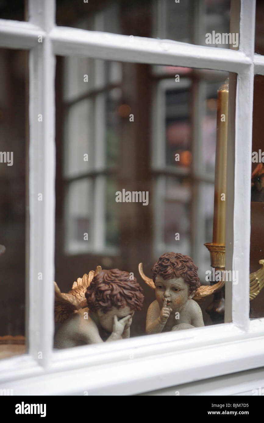 Angel figurines in a window Stock Photo - Alamy