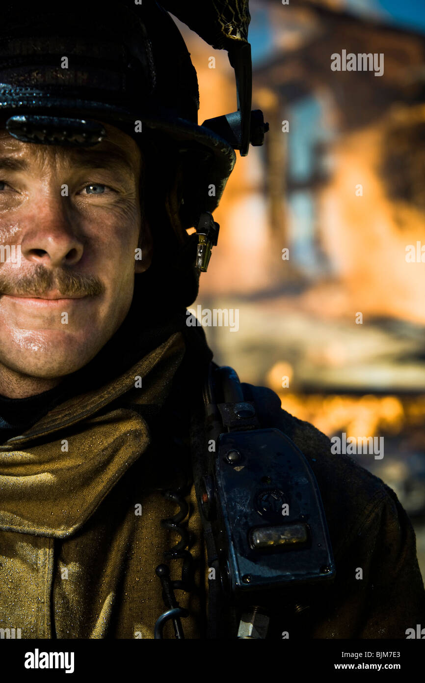 Portrait firefighter fire in background hi-res stock photography and ...