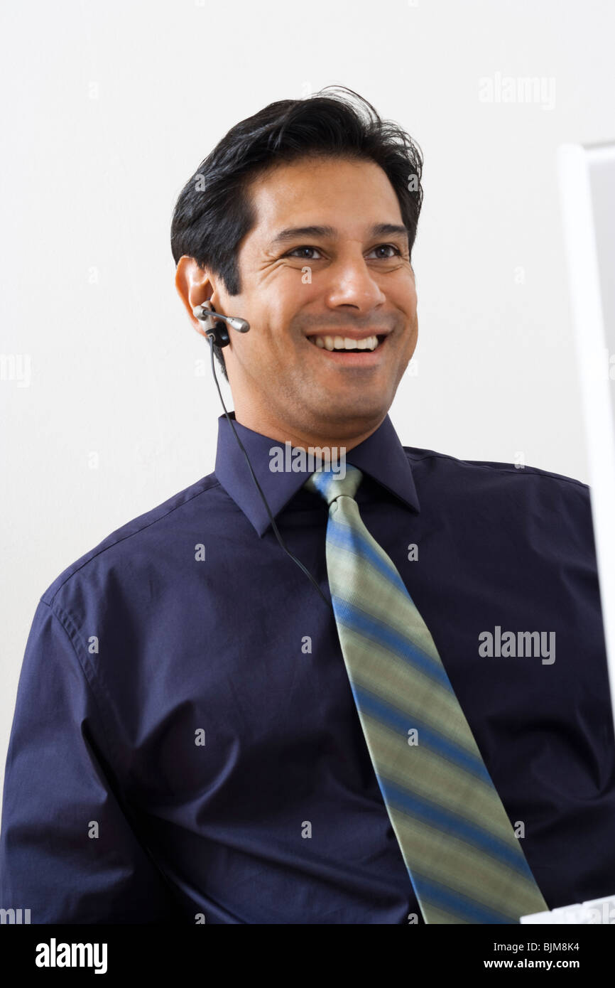Man working at a computer Stock Photo - Alamy