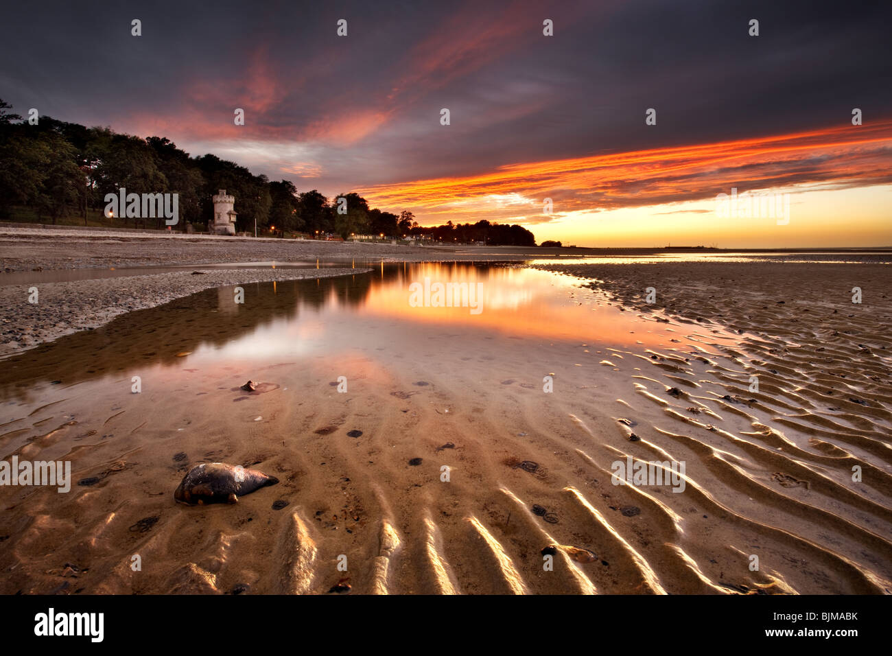 Sun setting over Appley Beach. Isle of Wight, England, UK Stock Photo ...