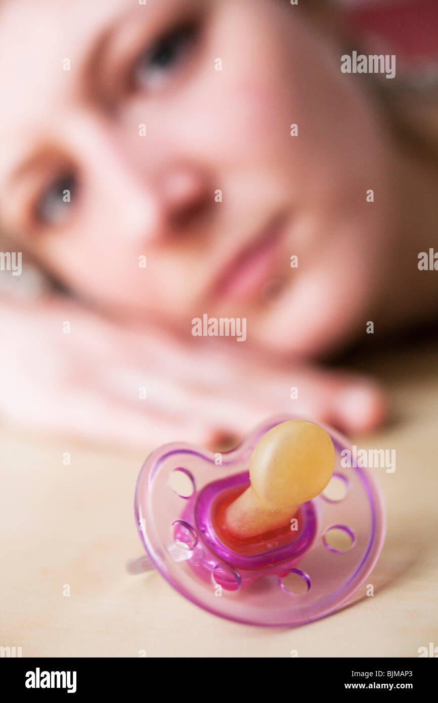 Woman pacifier hi-res stock photography and images - Alamy