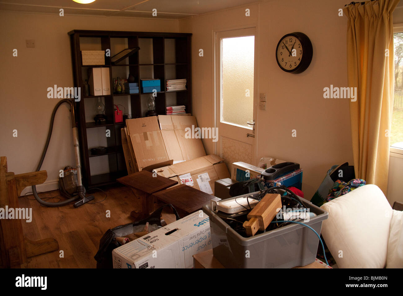 Moving house piles of boxes hi-res stock photography and images - Alamy