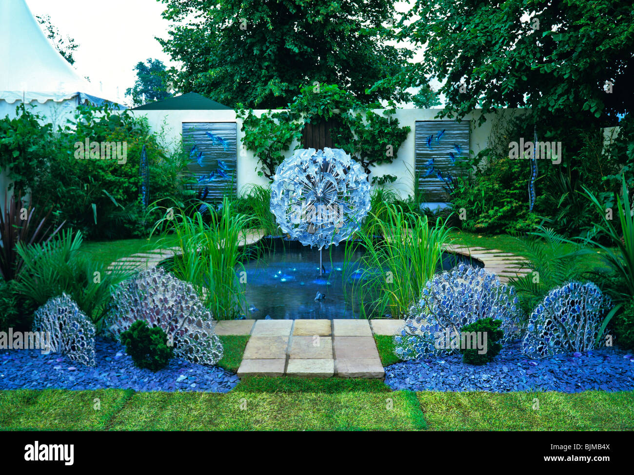 A decorative water garden with interesting glass features Stock Photo ...