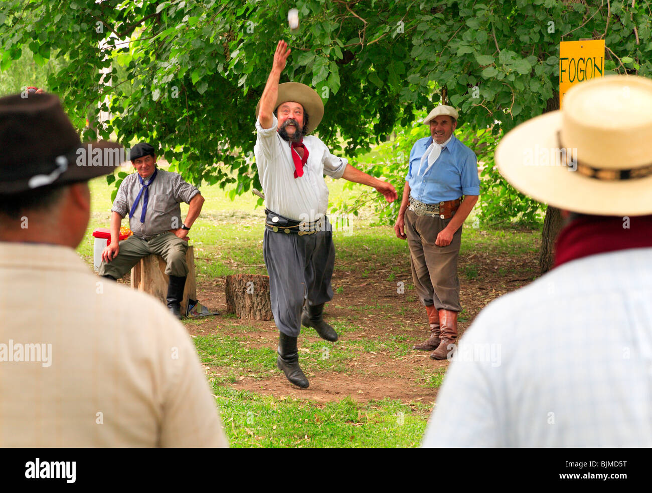 Paisanos (modern gauchos) playing "Taba" at San Antonio de Areco Gaucho ...