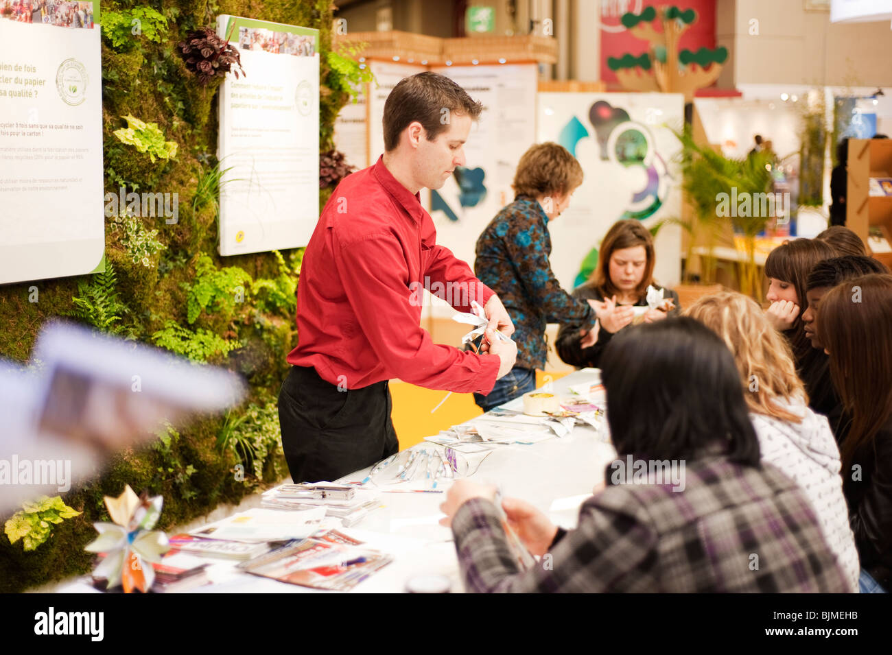 people learning how to do origami Stock Photo - Alamy