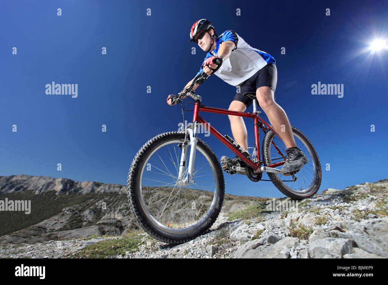 Person riding a bike Stock Photo - Alamy