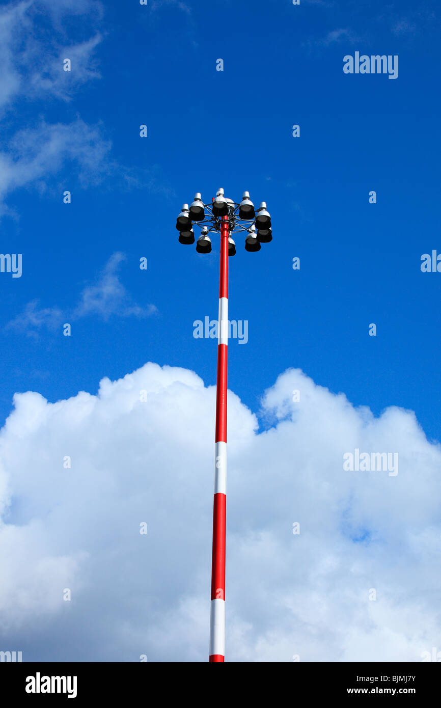 Light post against a blue sky Stock Photo - Alamy