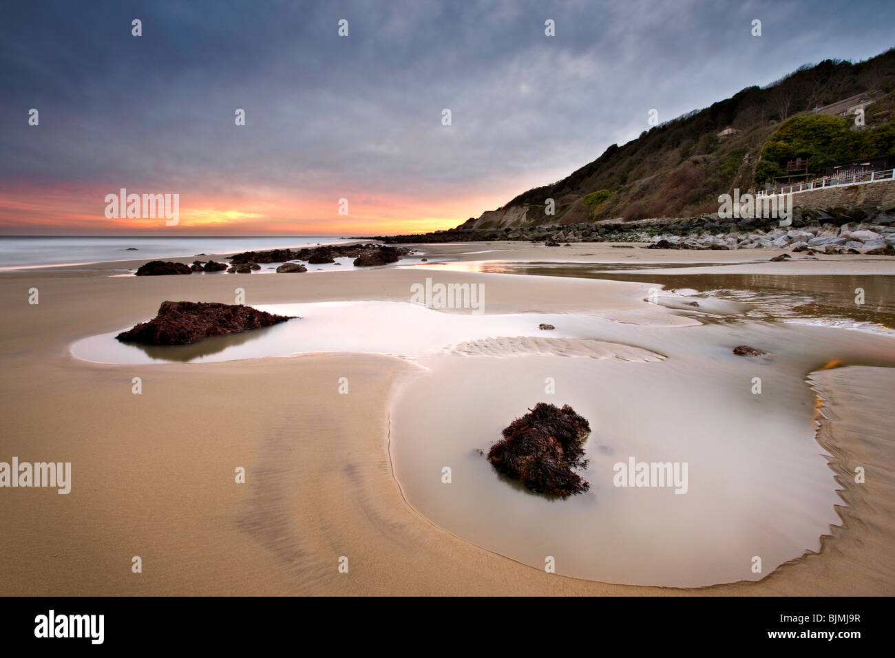Sun setting over Ventnor Bay. Isle of Wight, England, UK Stock Photo ...