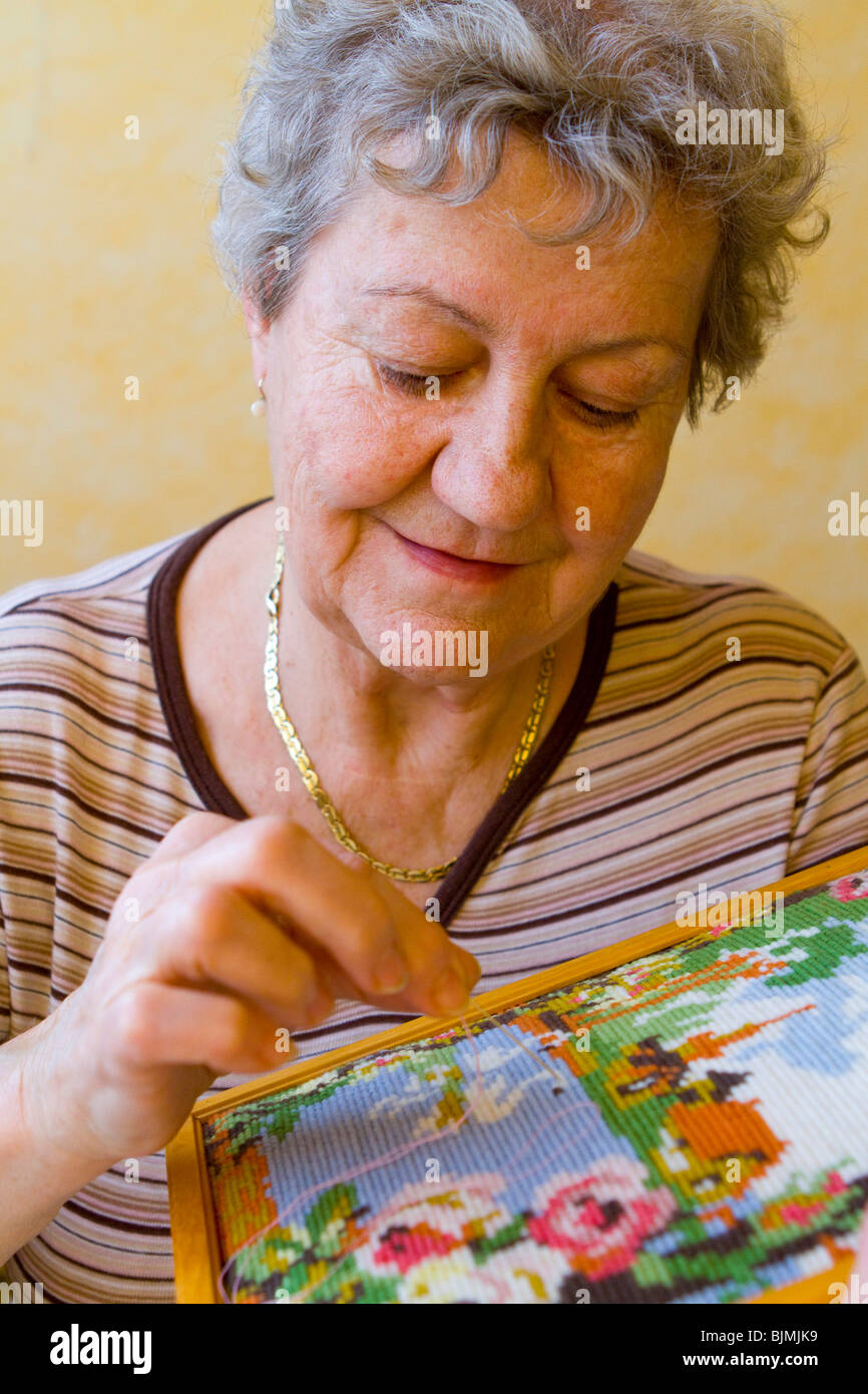 Doing embroidery hi-res stock photography and images - Alamy