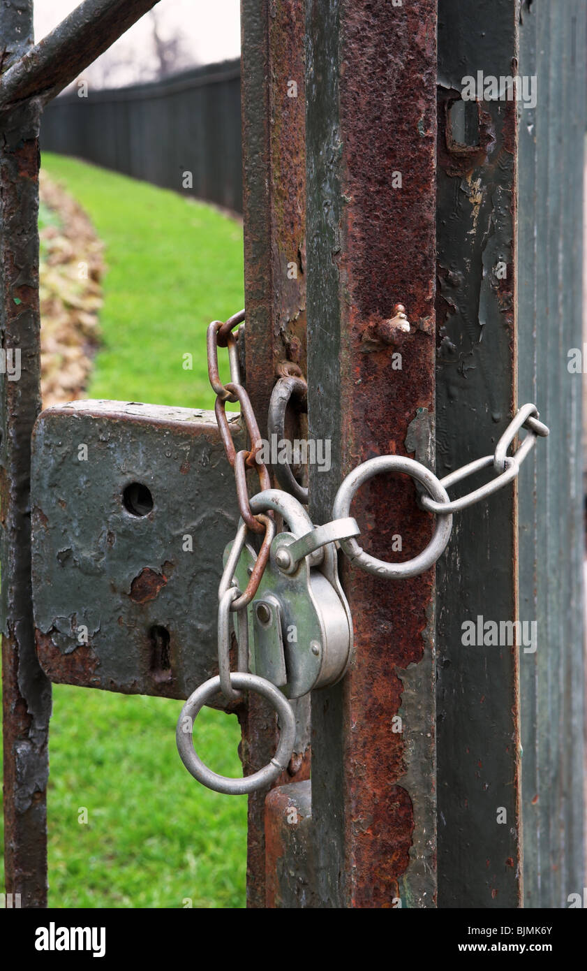 Rusted lock on a gate Stock Photo - Alamy