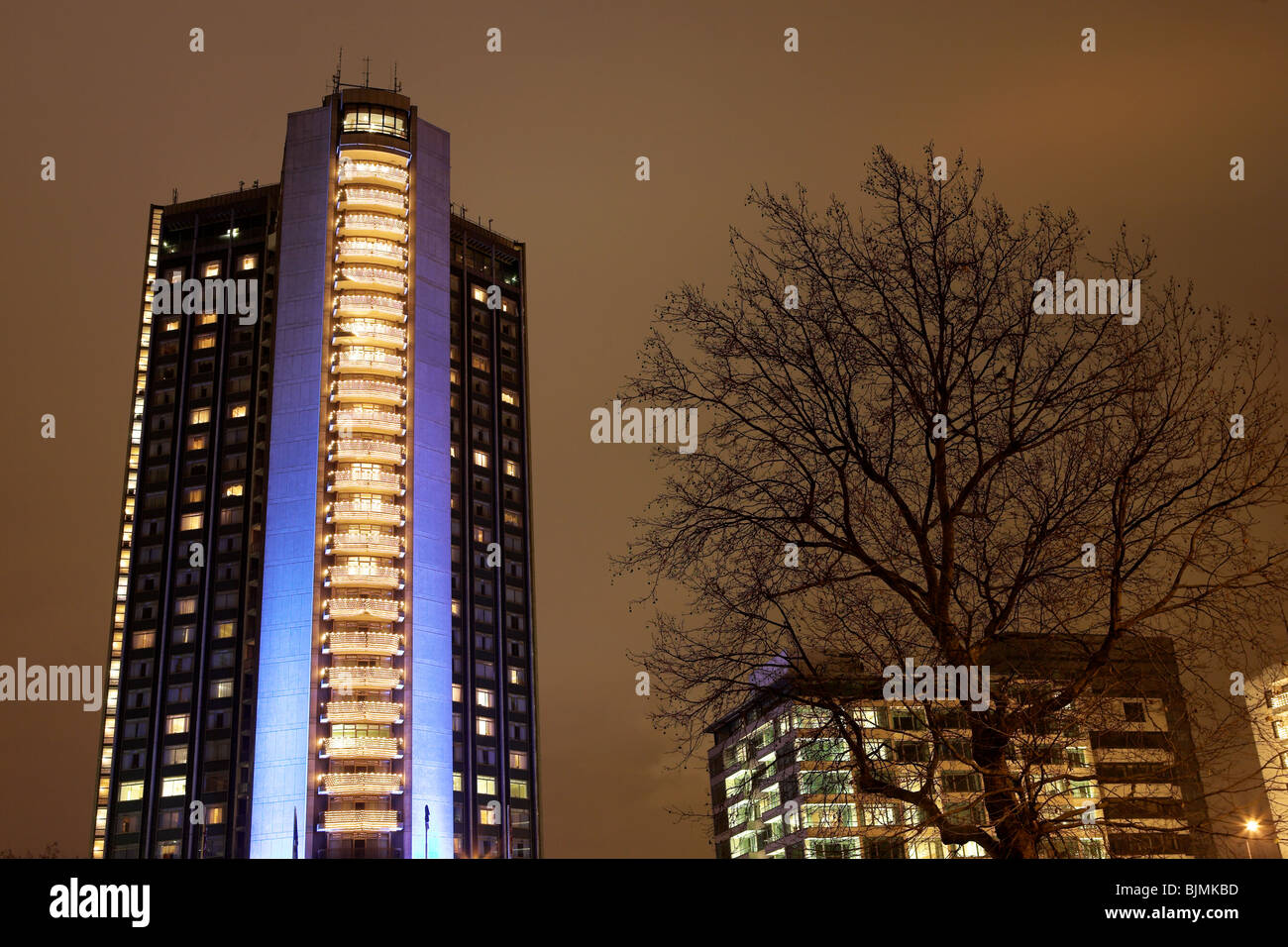 Night scene of a street and buildings Stock Photo - Alamy
