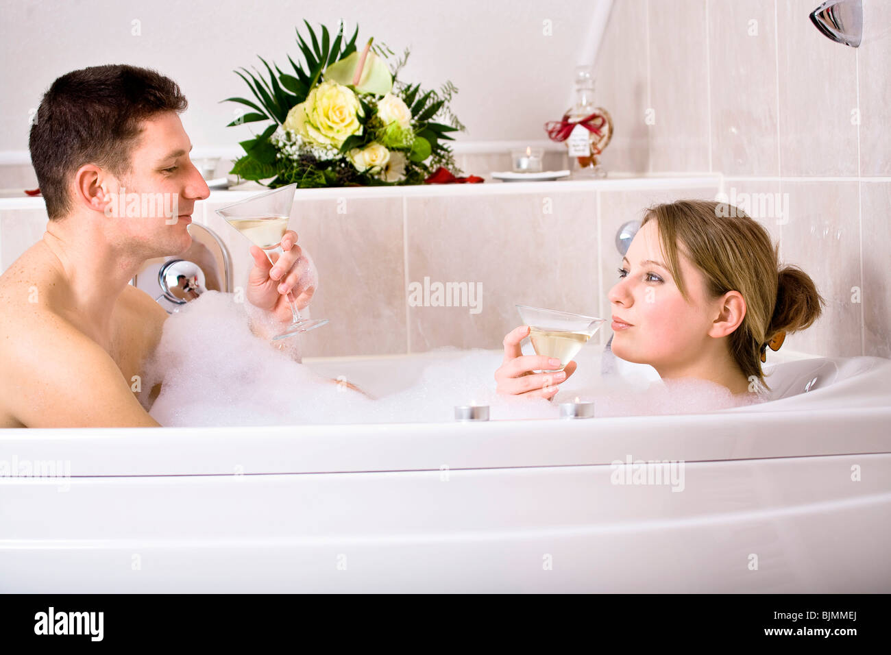 Two women in bathtub hi-res stock photography and images - Alamy
