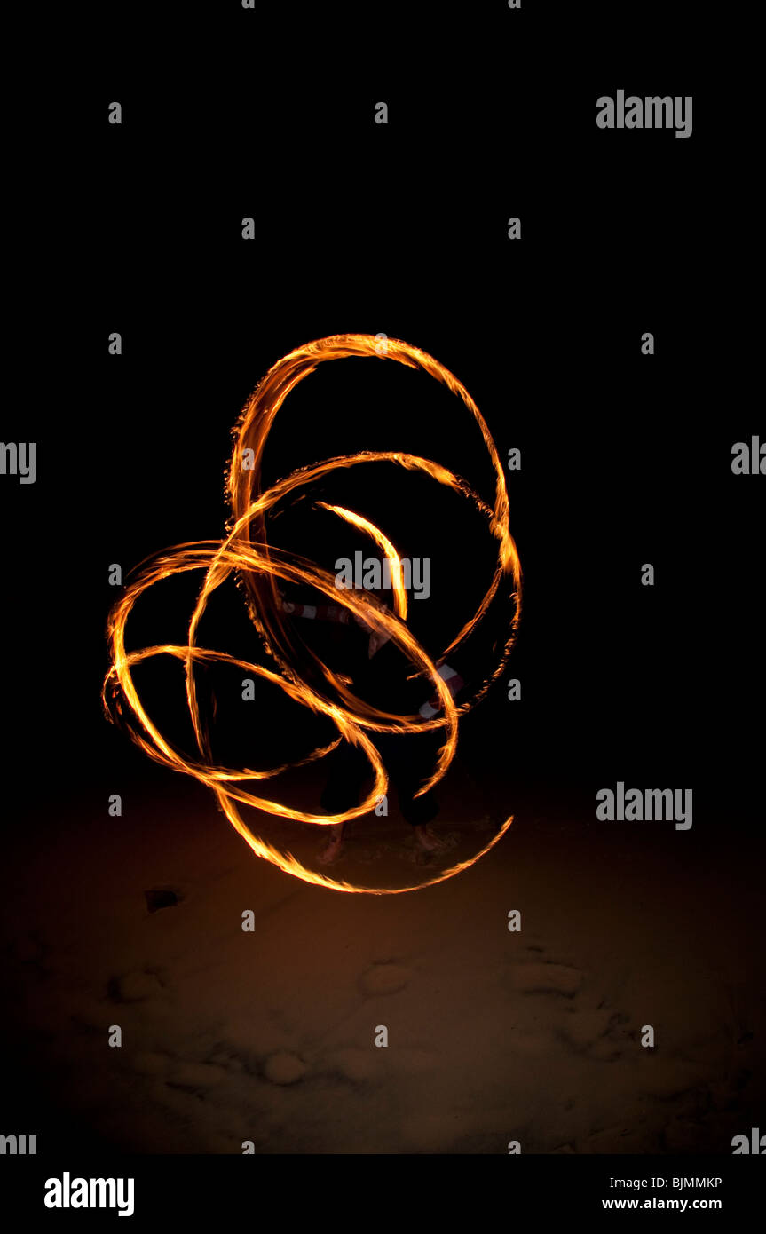 Fire twirling performer hi-res stock photography and images - Alamy