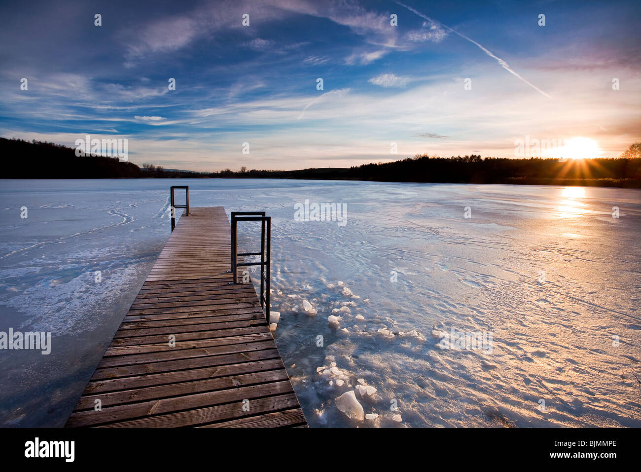 Frozen lake covered in ice hi-res stock photography and images - Alamy