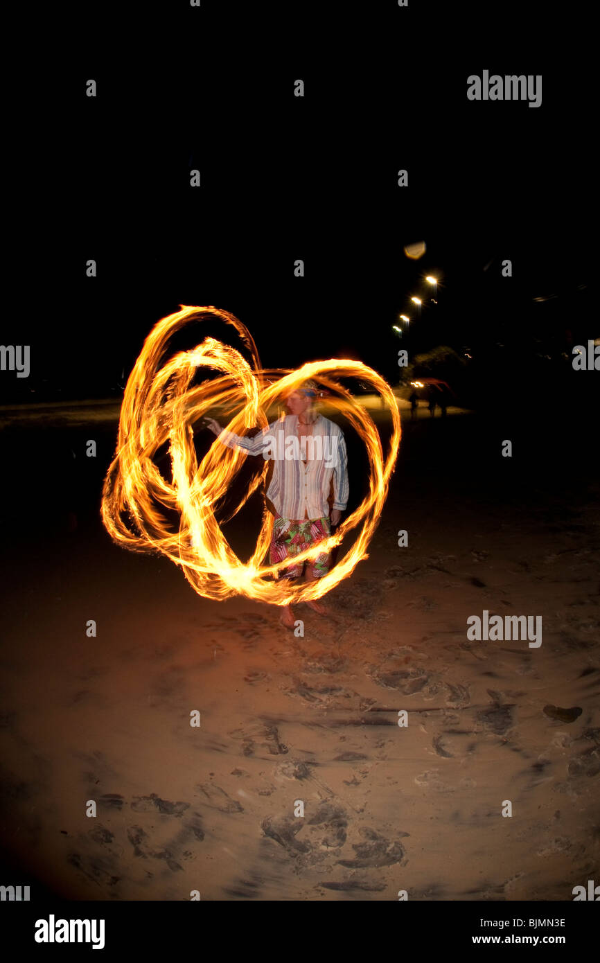 FIRE TWIRLING ON MOOLOOLABA BEACH Stock Photo - Alamy