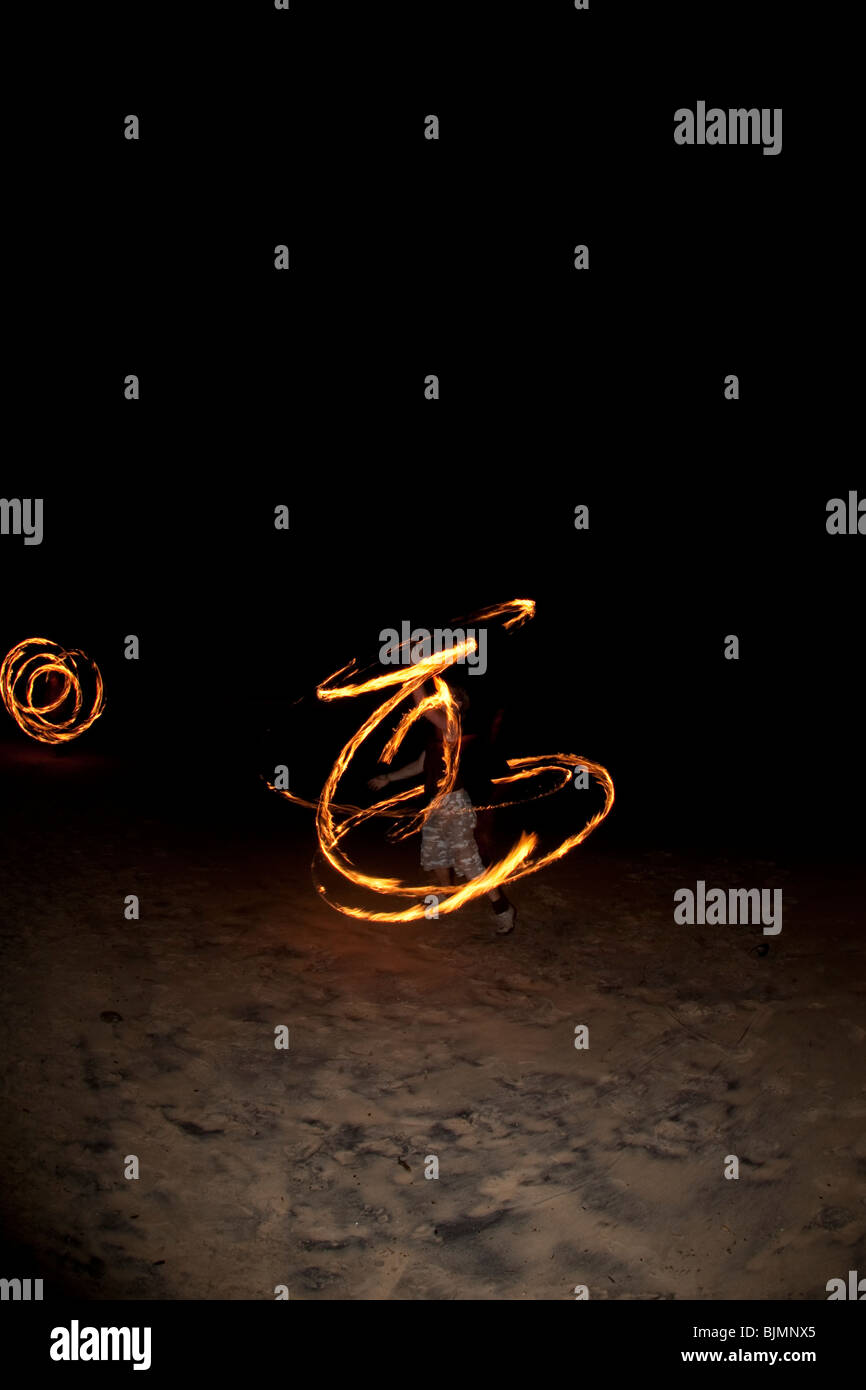 Twirling Fire Sticks High Resolution Stock Photography and Images - Alamy