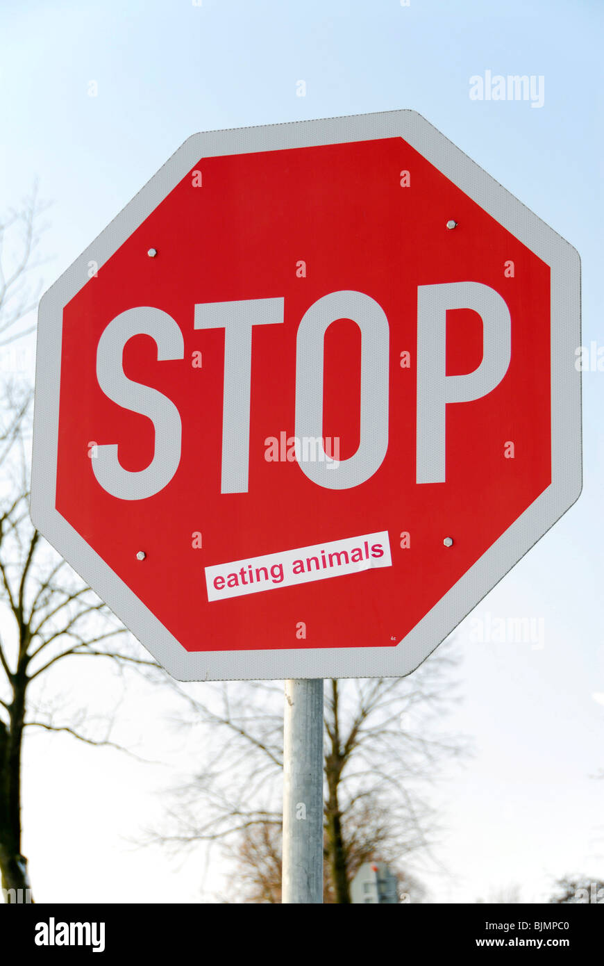 Stop eating animals, stop sign with sticker Stock Photo - Alamy