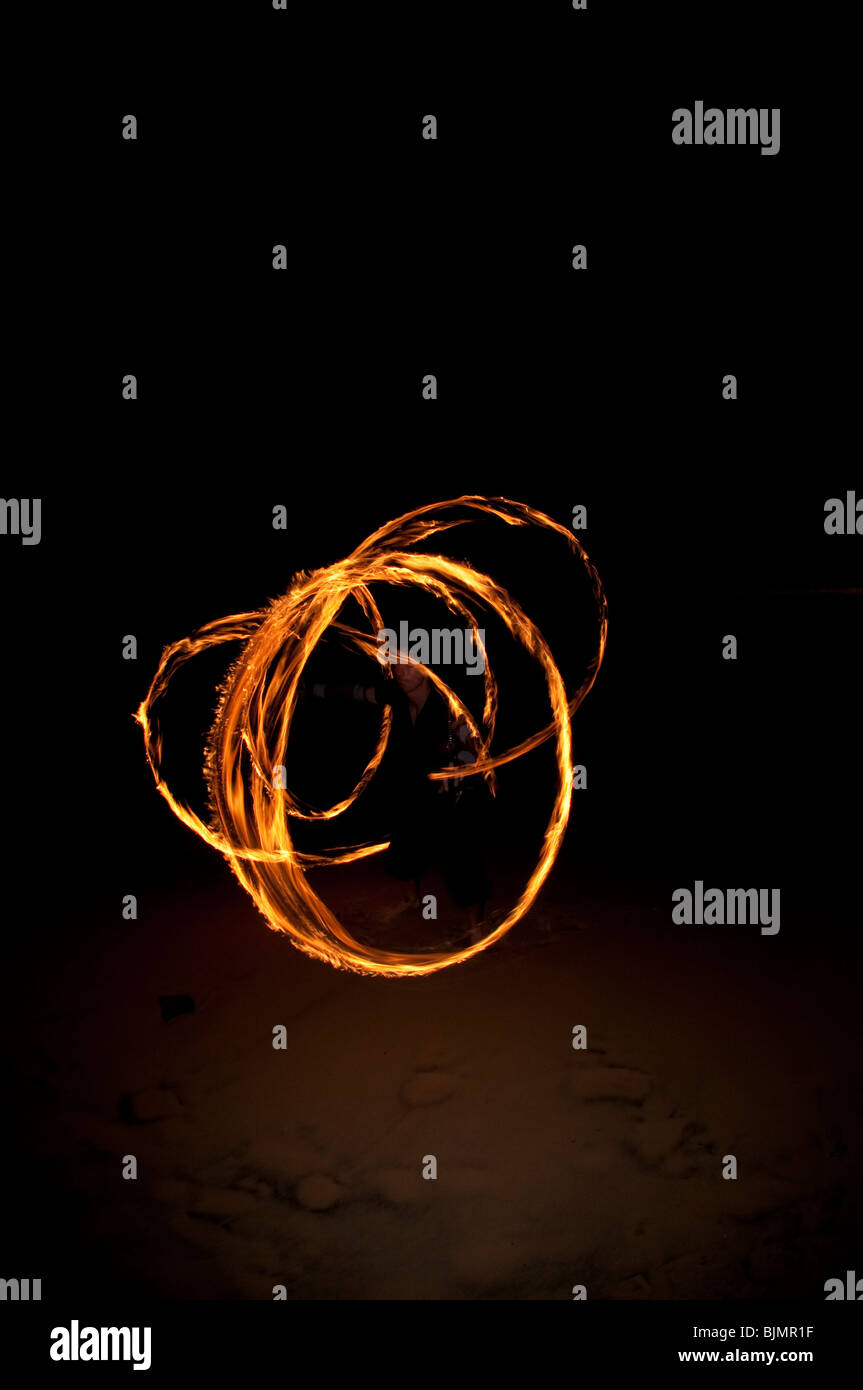 Twirling Fire Sticks High Resolution Stock Photography and Images - Alamy