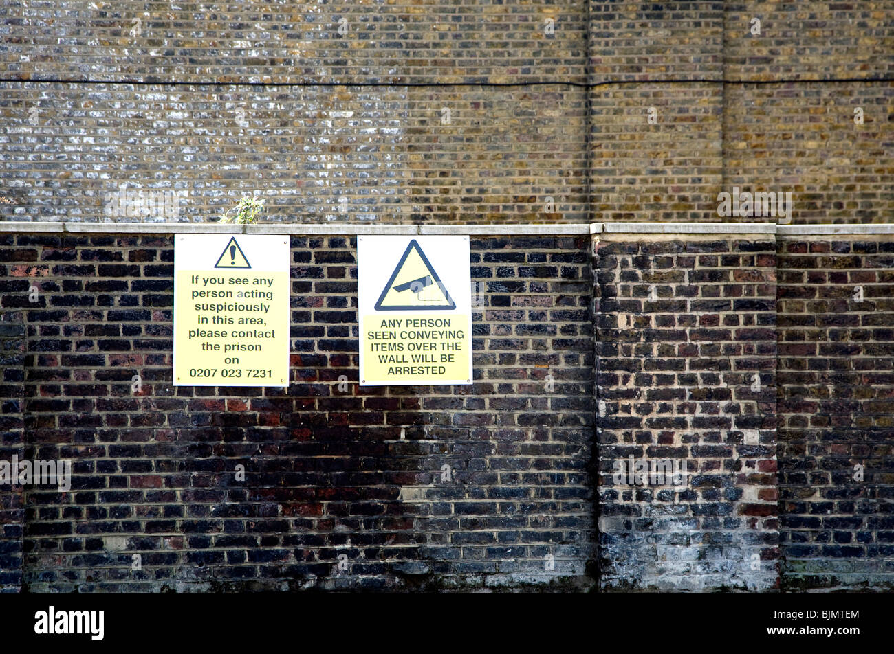 Signs on wall of H M Prison Pentonville, London Stock Photo - Alamy