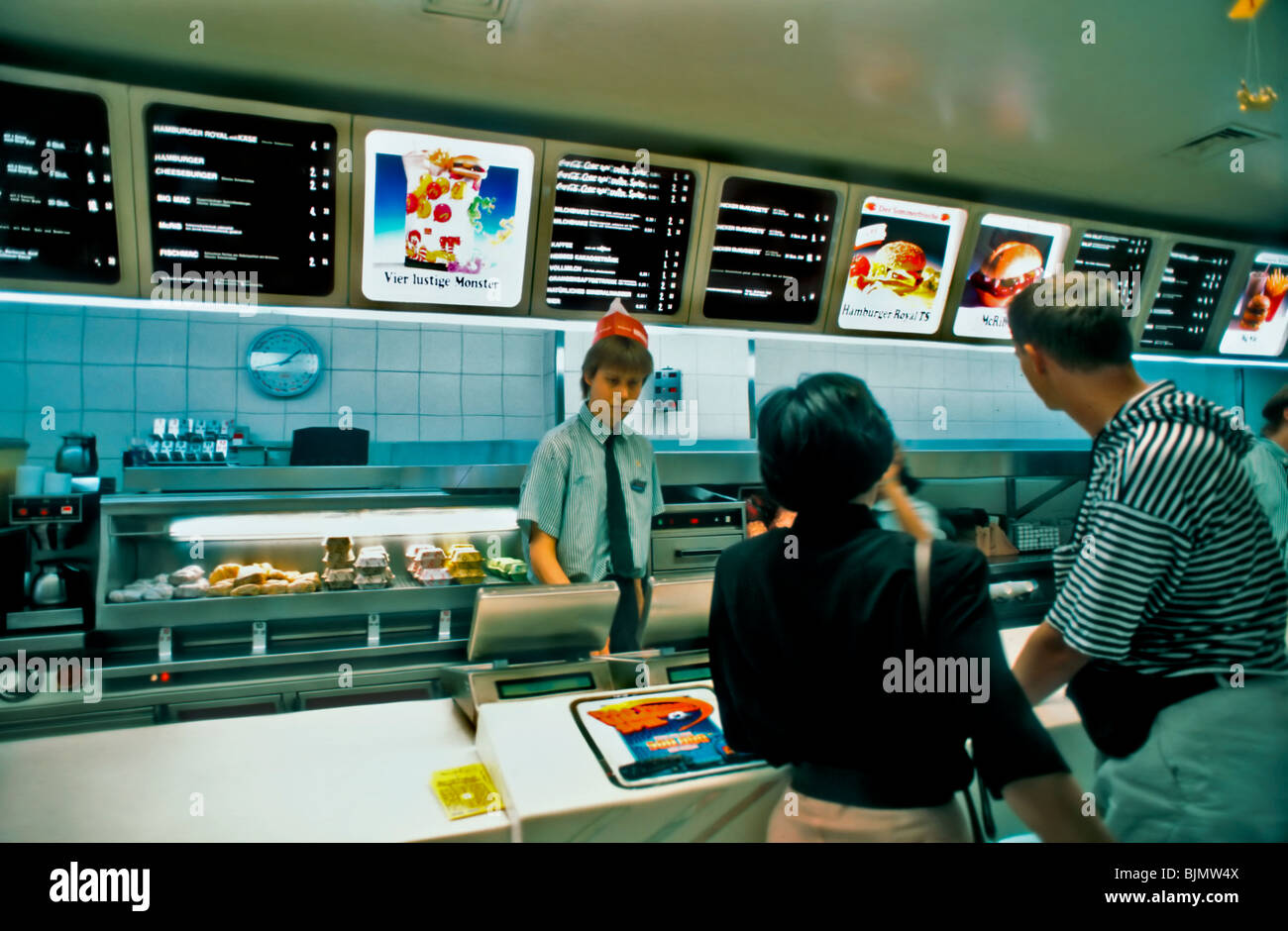Berlin, Germany - German Male Teenager Working in Fast Food Restaurant ...