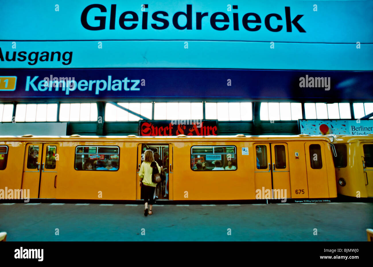 Berlin, Germany - People taking Transportation, Subway Station, Train ...