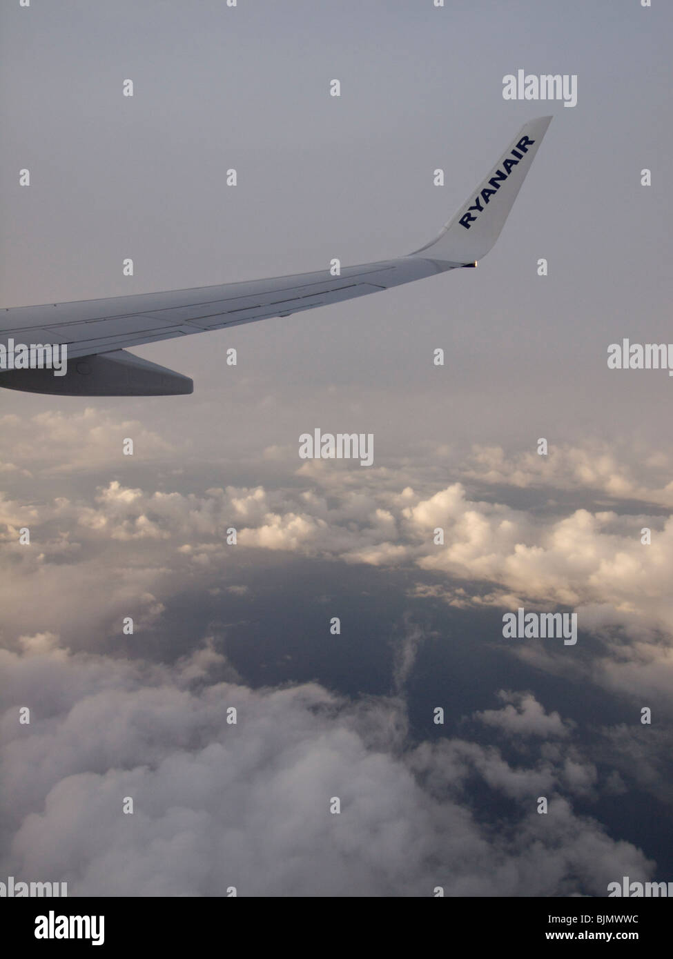 Boeing 737-800 wingtip Ryanair over cloudy Europe Stock Photo - Alamy