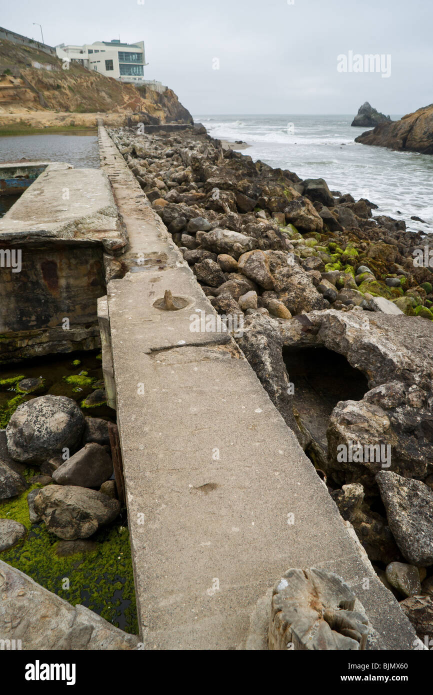 The ruins of the Sutro Baths in San Francisco with the Cliff House ...