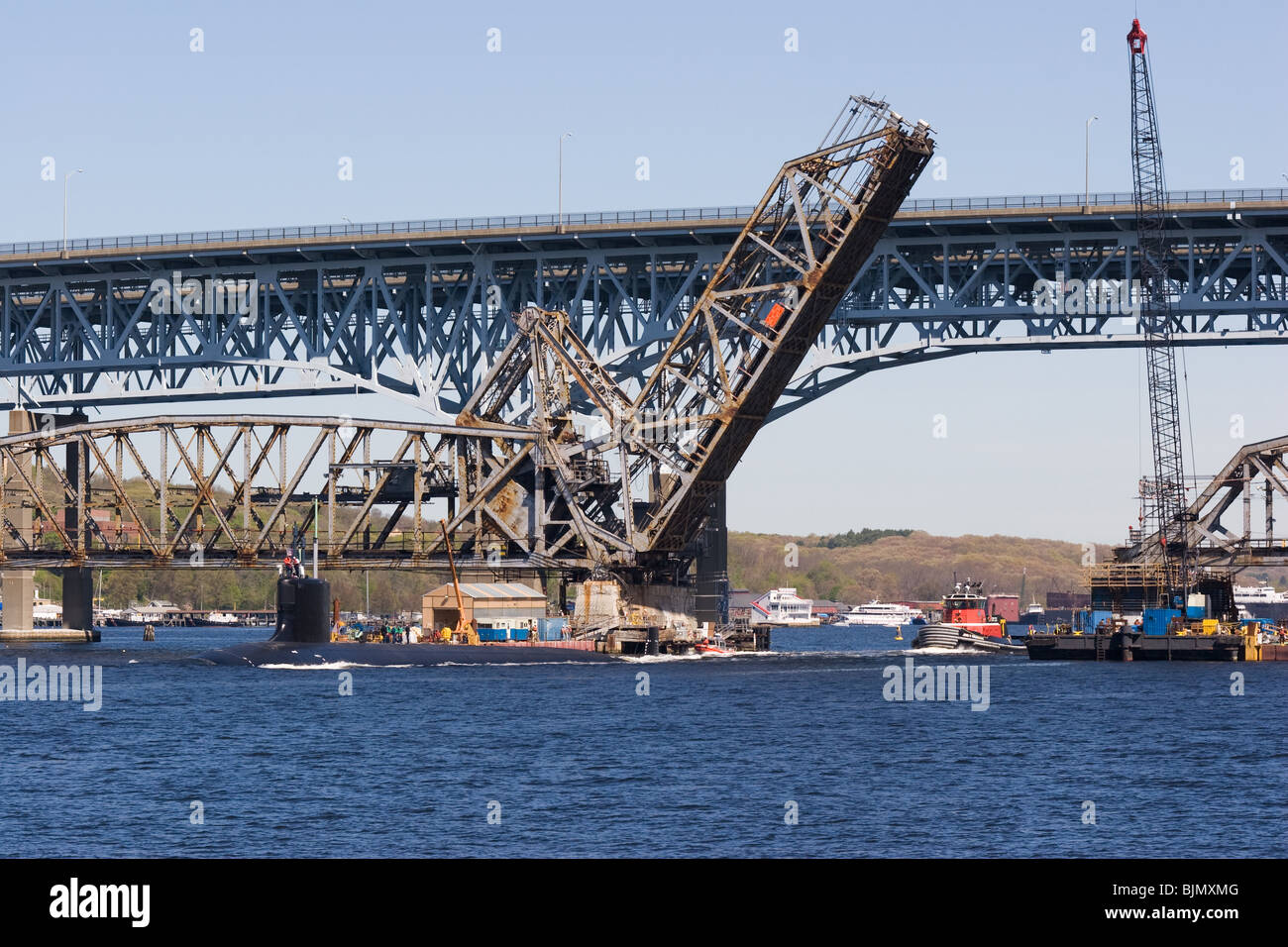A US Navy Virginia class fast attack submarine heads through the Amtrak ...