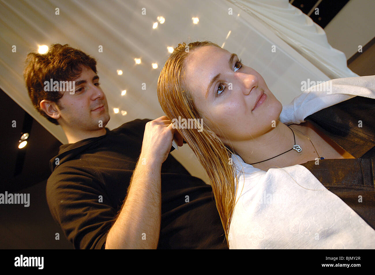 hair designer with Model Stock Photo - Alamy