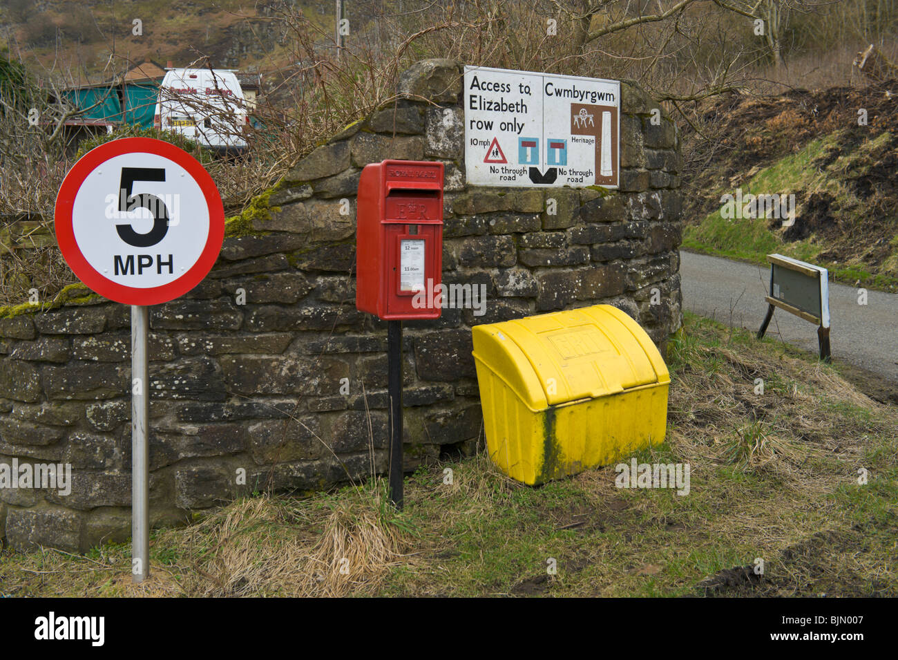 Signage red postbox yellow grit bin and speed warning sign at Elizabeth ...