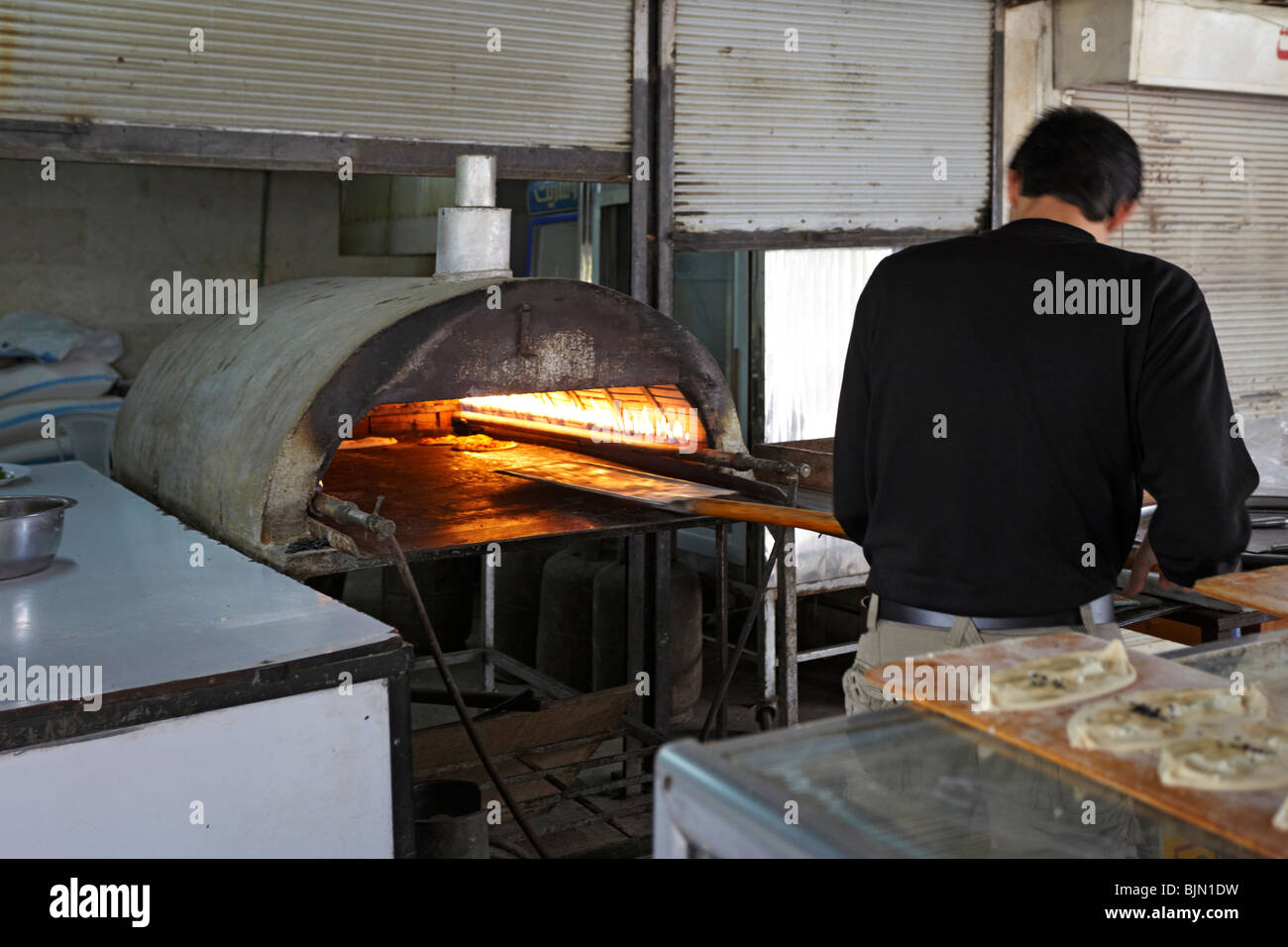 Latakia Syria cooking breakfast at the roadside Stock Photo - Alamy