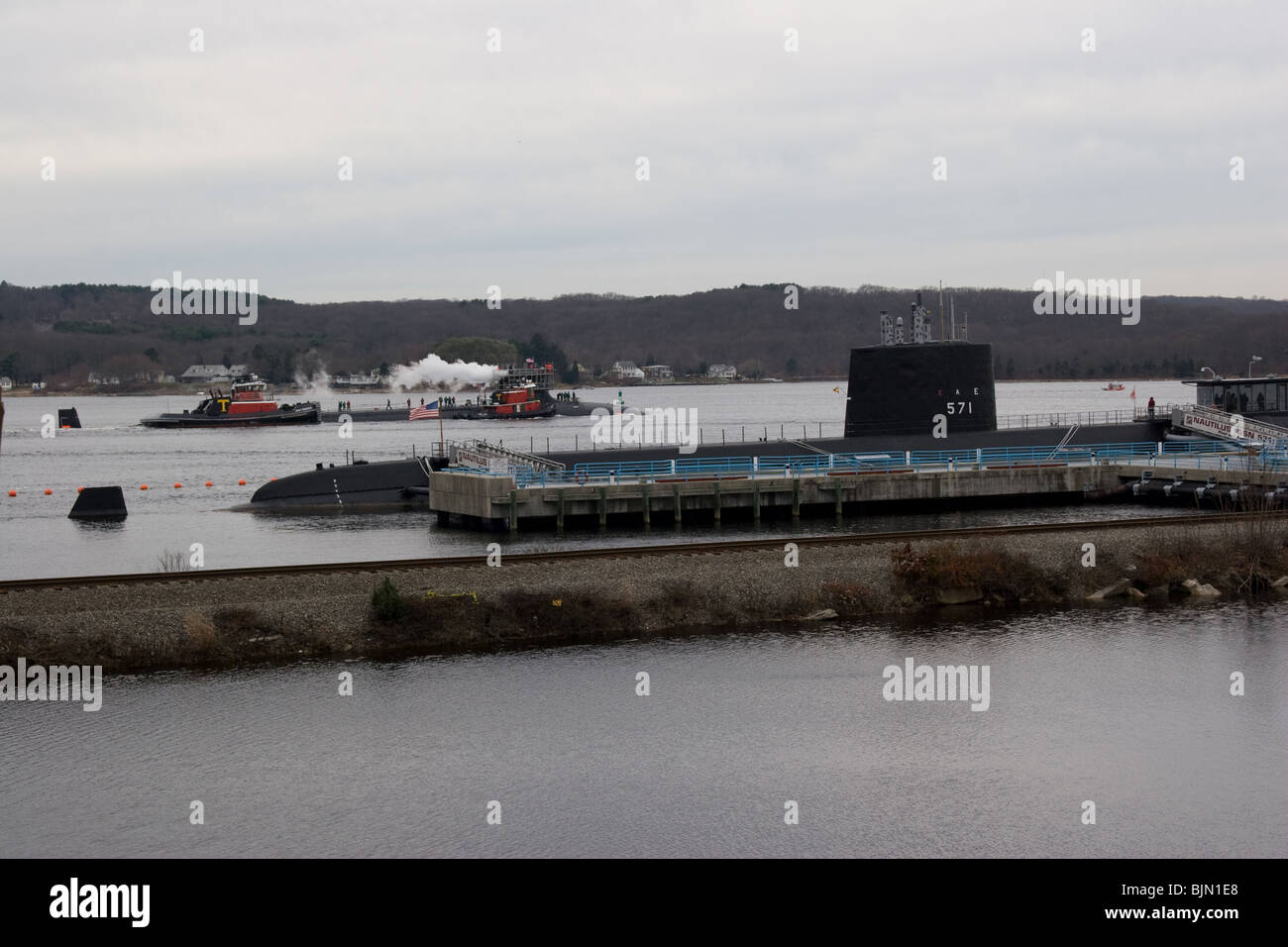 A US Navy Virginia class attack submarine, under diesel power, passes ...