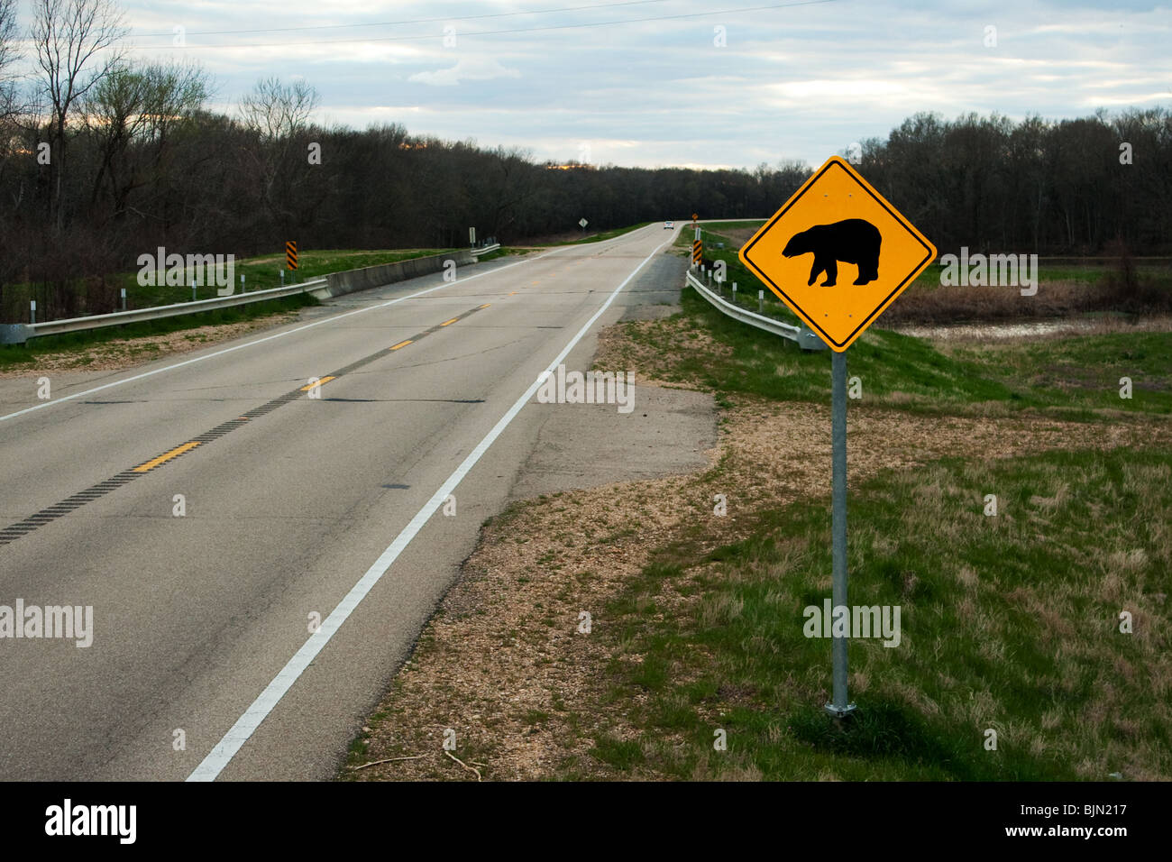 Bear crossing road sign hi-res stock photography and images - Alamy