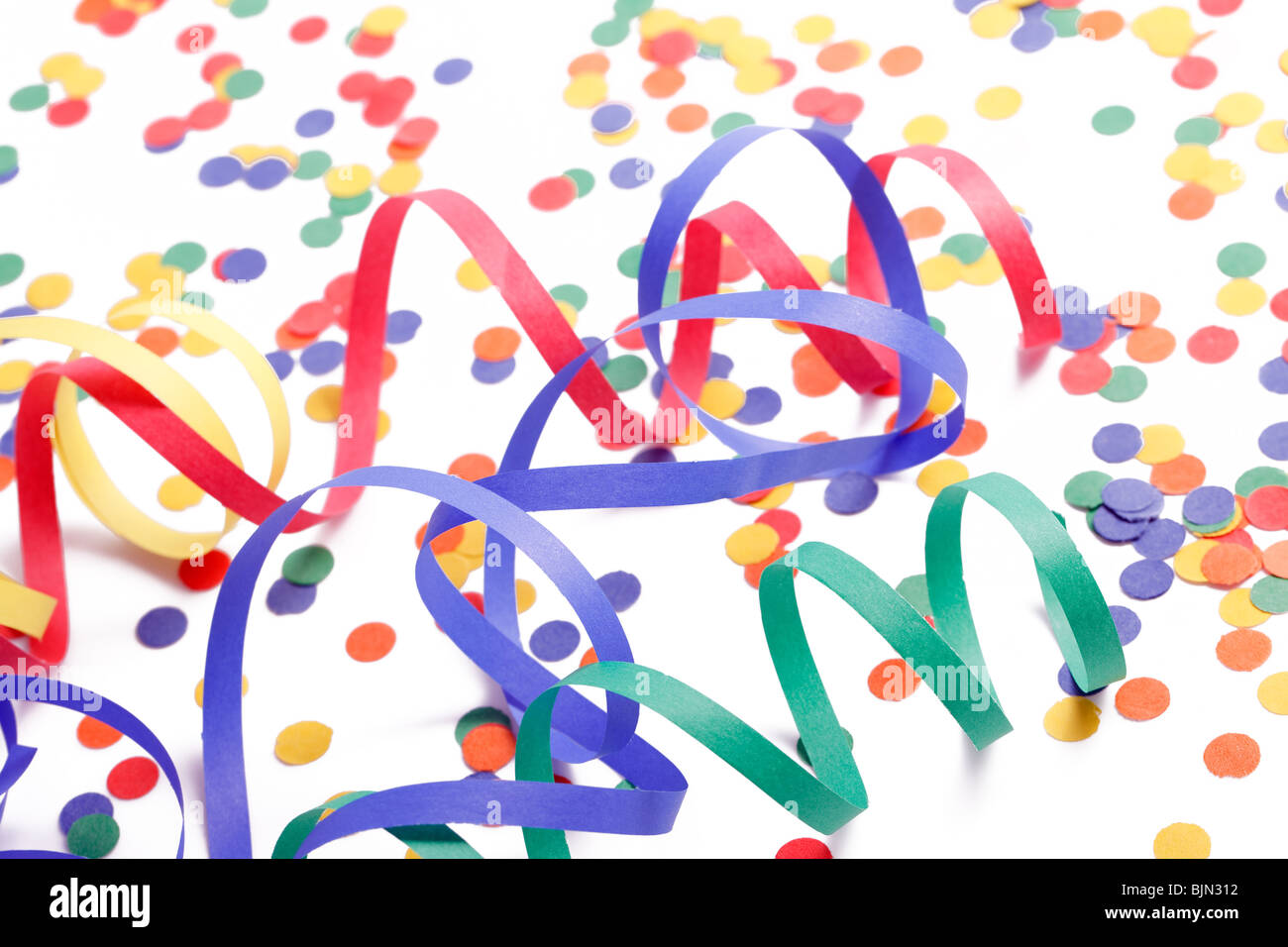 colorful paper streamer isolated on white background Stock Photo - Alamy