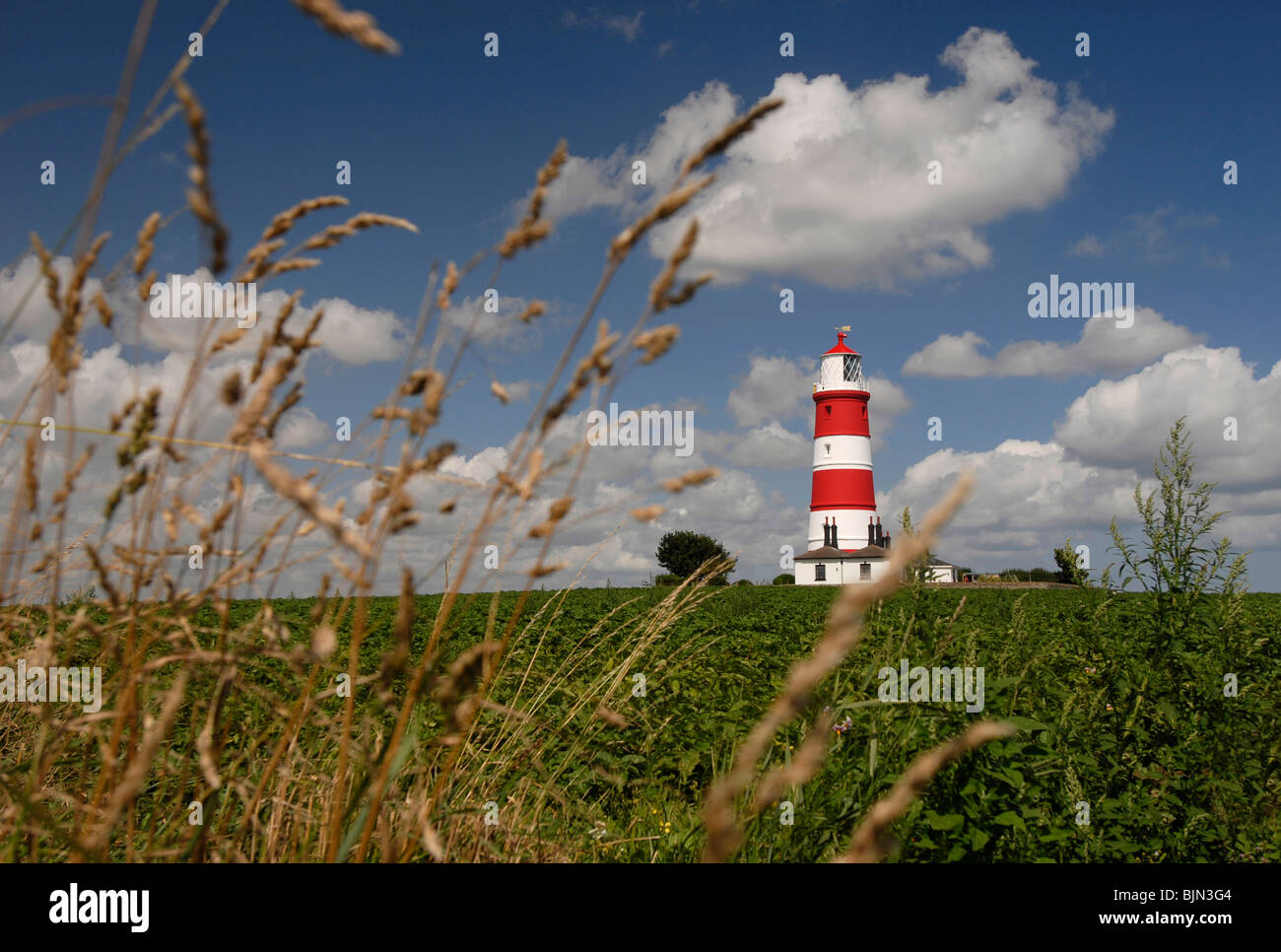 Happisburgh lighthouse on the North Norfolk coast, built in 1790, is ...