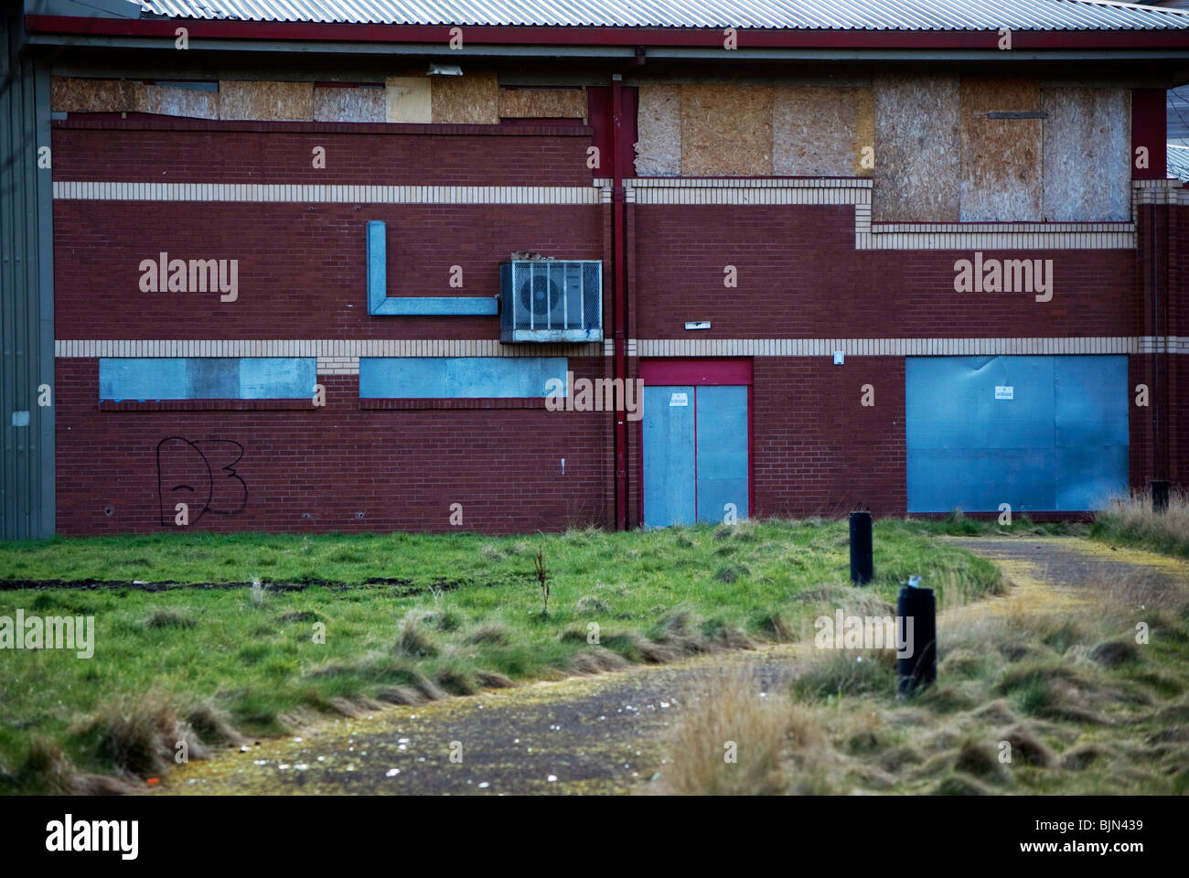 Boarded-up industrial premises in Edinburgh, Scotland Stock Photo - Alamy