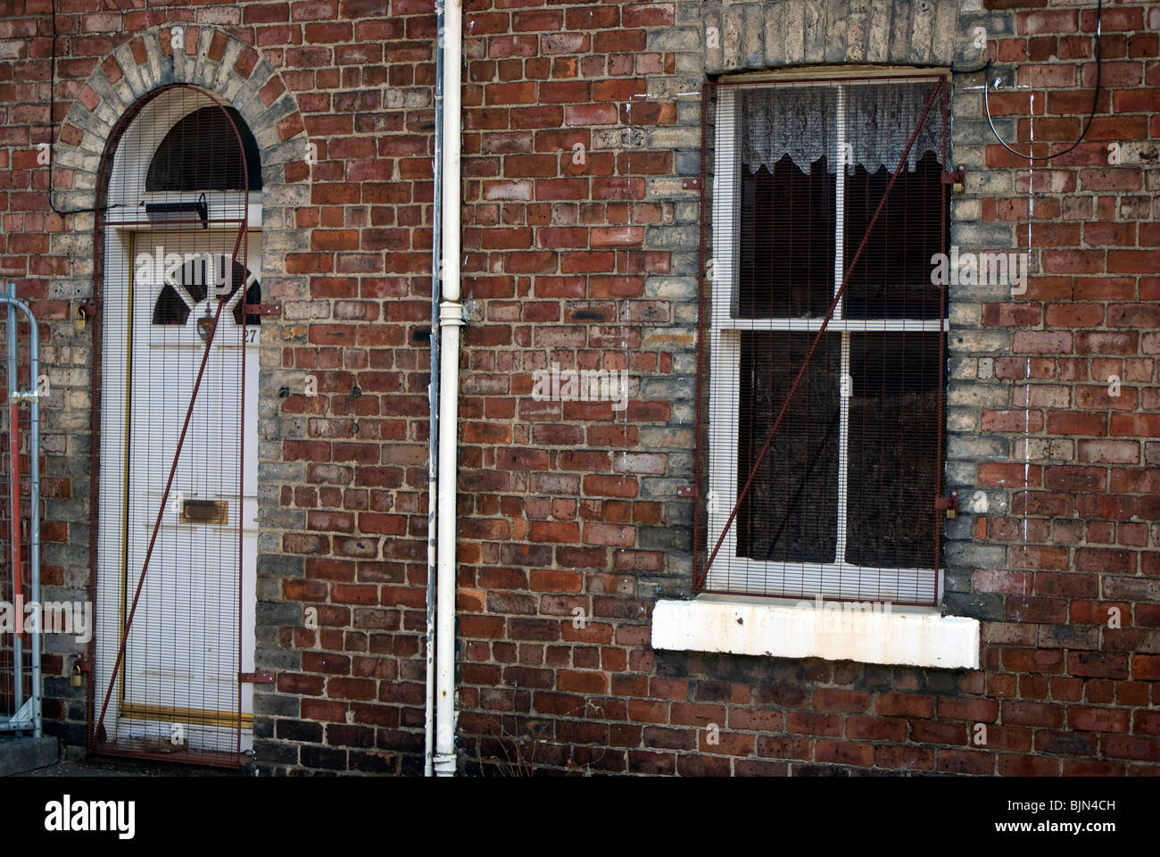 Boarded-up house next to demolished factory in Edinburgh, Scotland ...