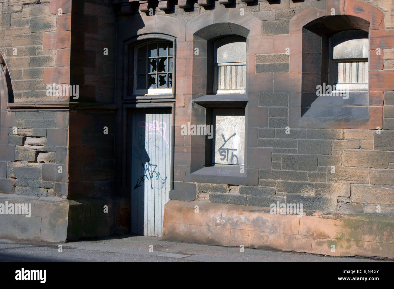 Boarded-up industrial premises in Edinburgh, Scotland Stock Photo - Alamy