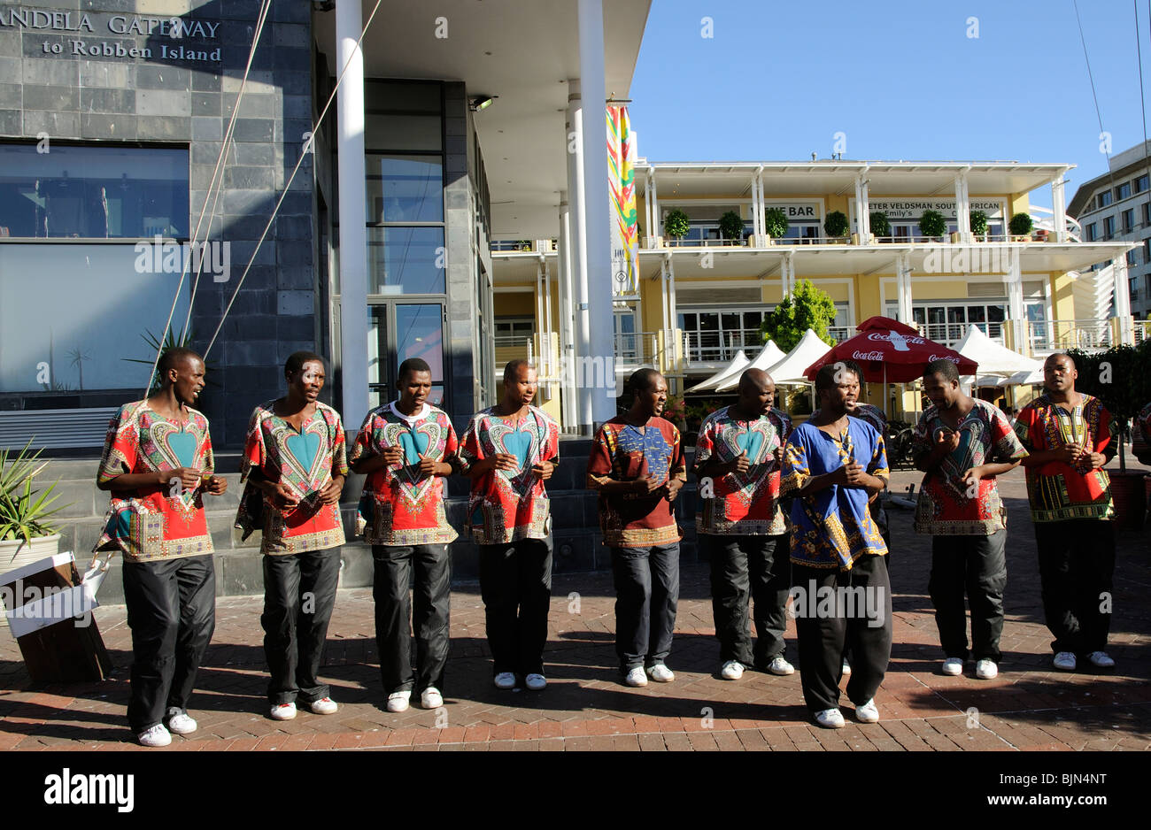 Group of African singers and dancers entertain outside the Nelson ...