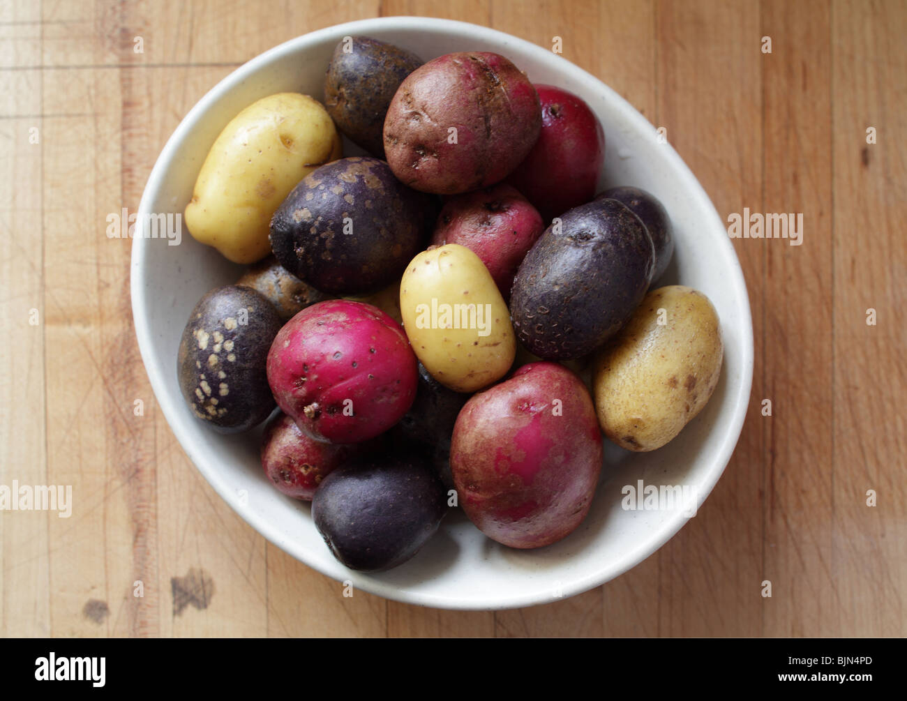 Mixed colored potatoes Stock Photo - Alamy