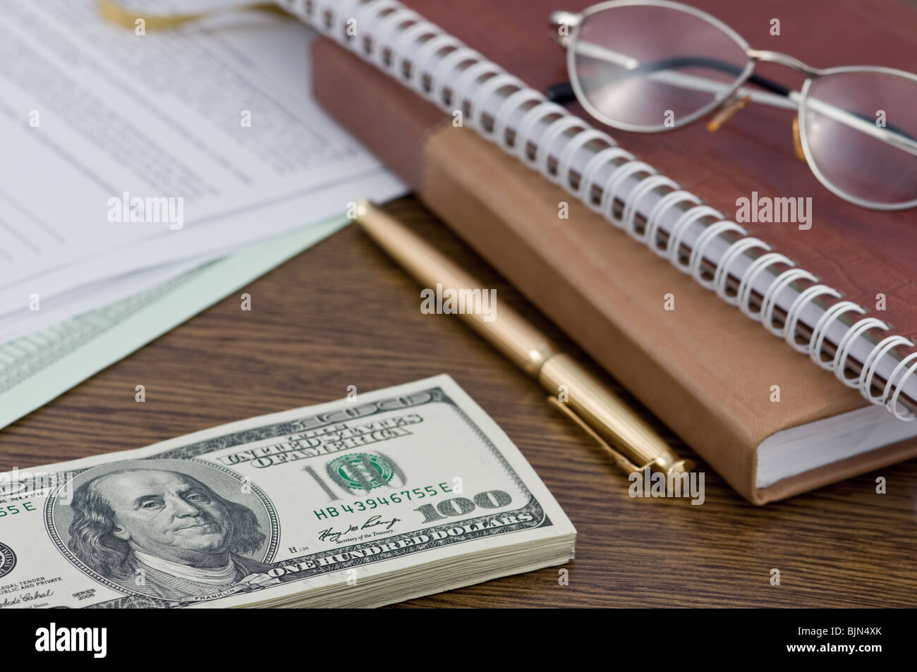 office objects on wood desk Stock Photo - Alamy
